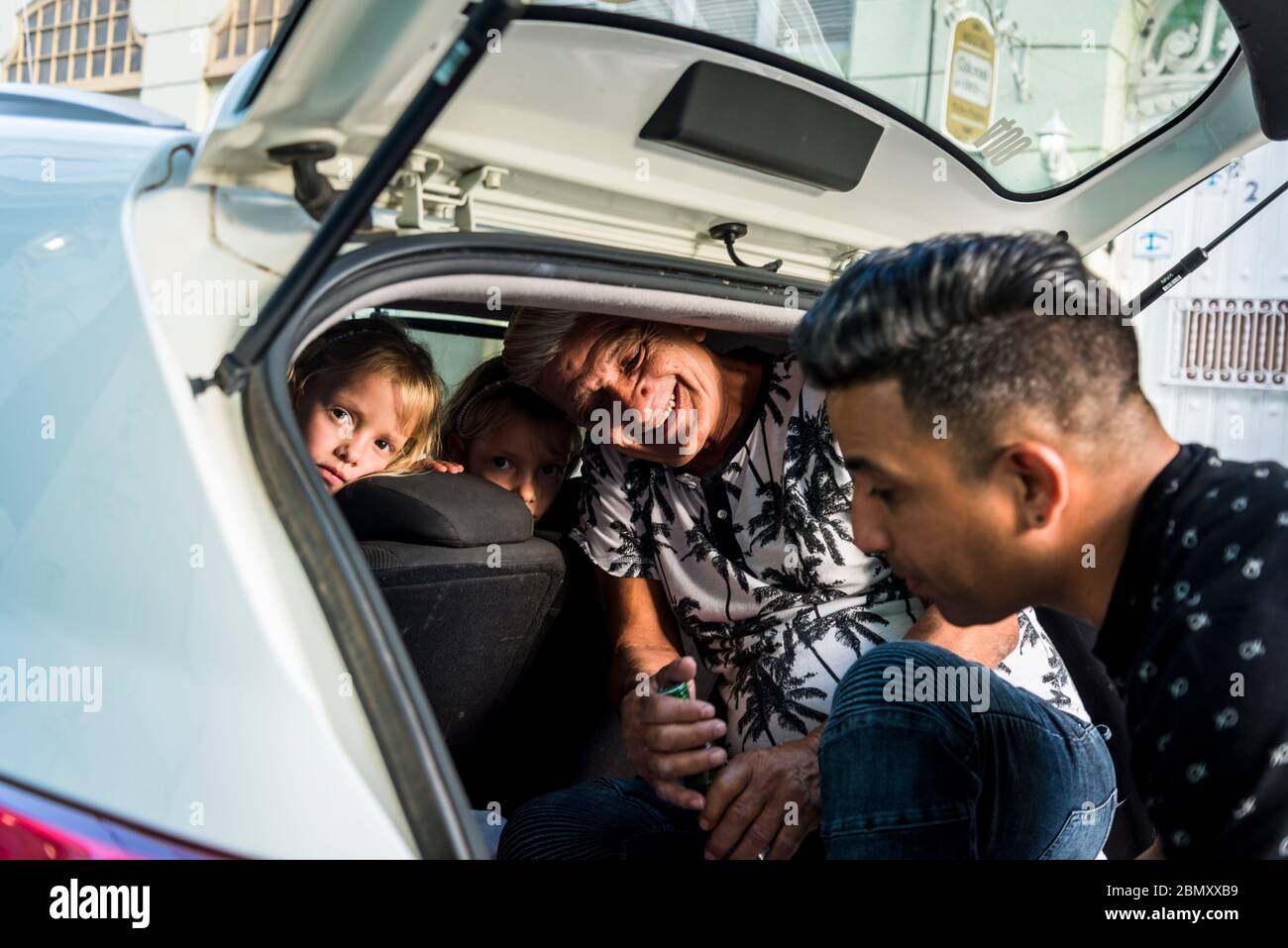 Squeezed in car hi-res stock photography and images - Alamy