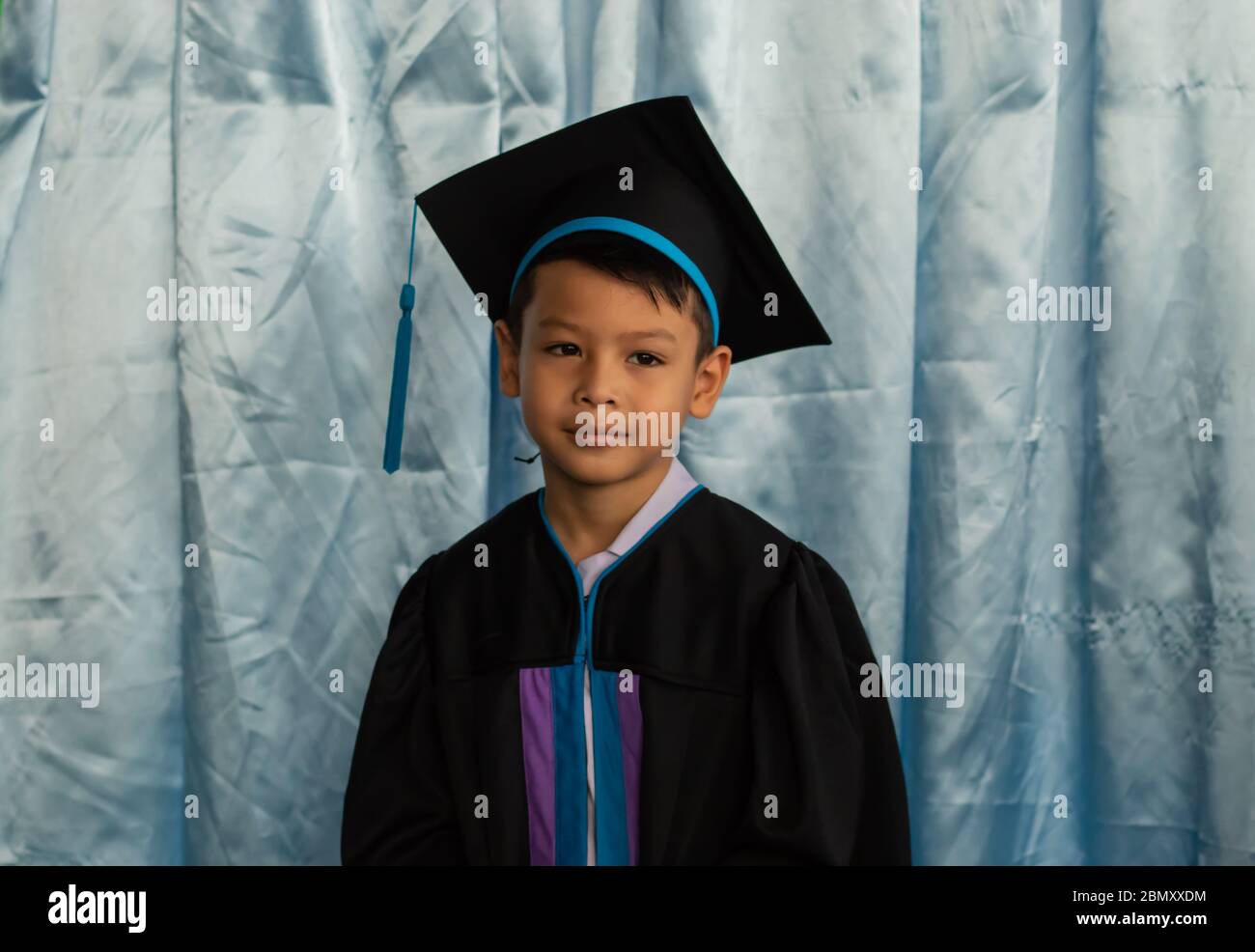 The boy graduated from kindergarten. This study is the first to advance ...