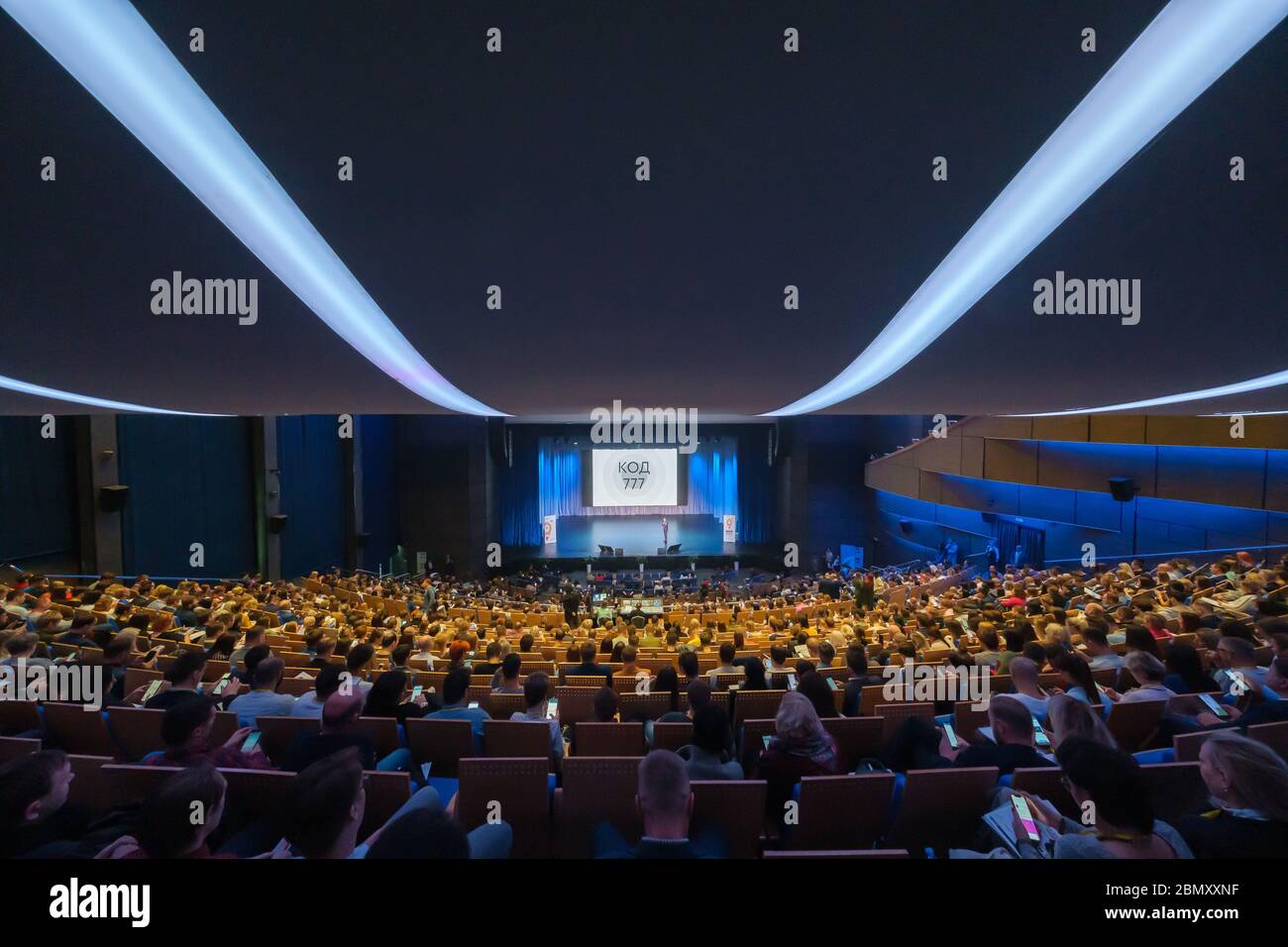 Business conference attendees sit and listen Stock Photo - Alamy