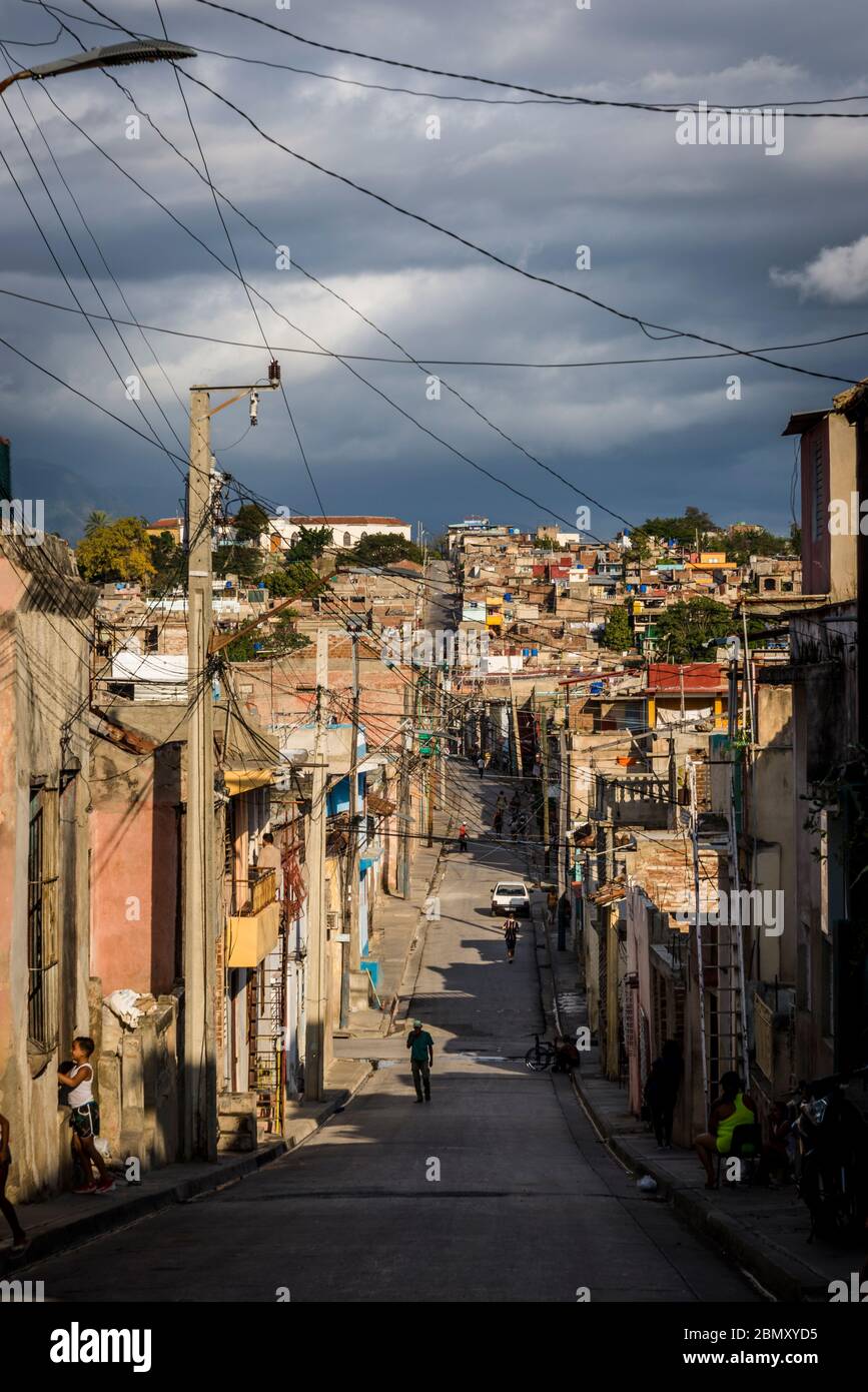 Street in poor, working class neighbourhood, Santiago de Cuba, Cuba ...