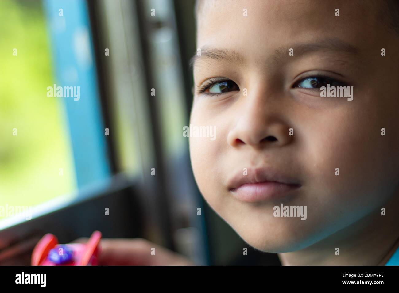 The boys are watching a train window views Stock Photo - Alamy