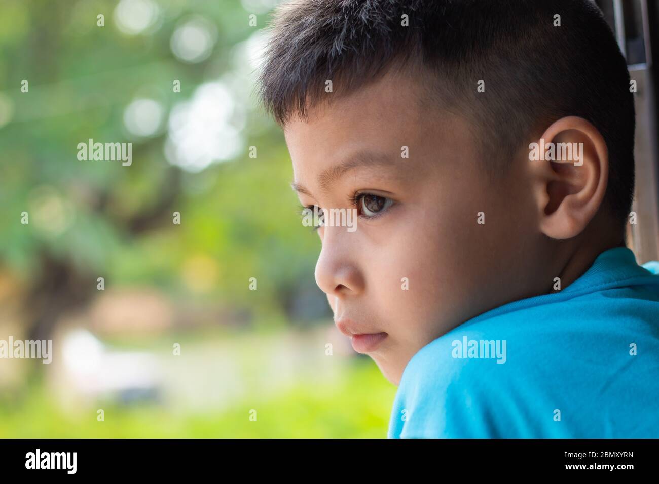 The boys are watching a train window views Stock Photo - Alamy