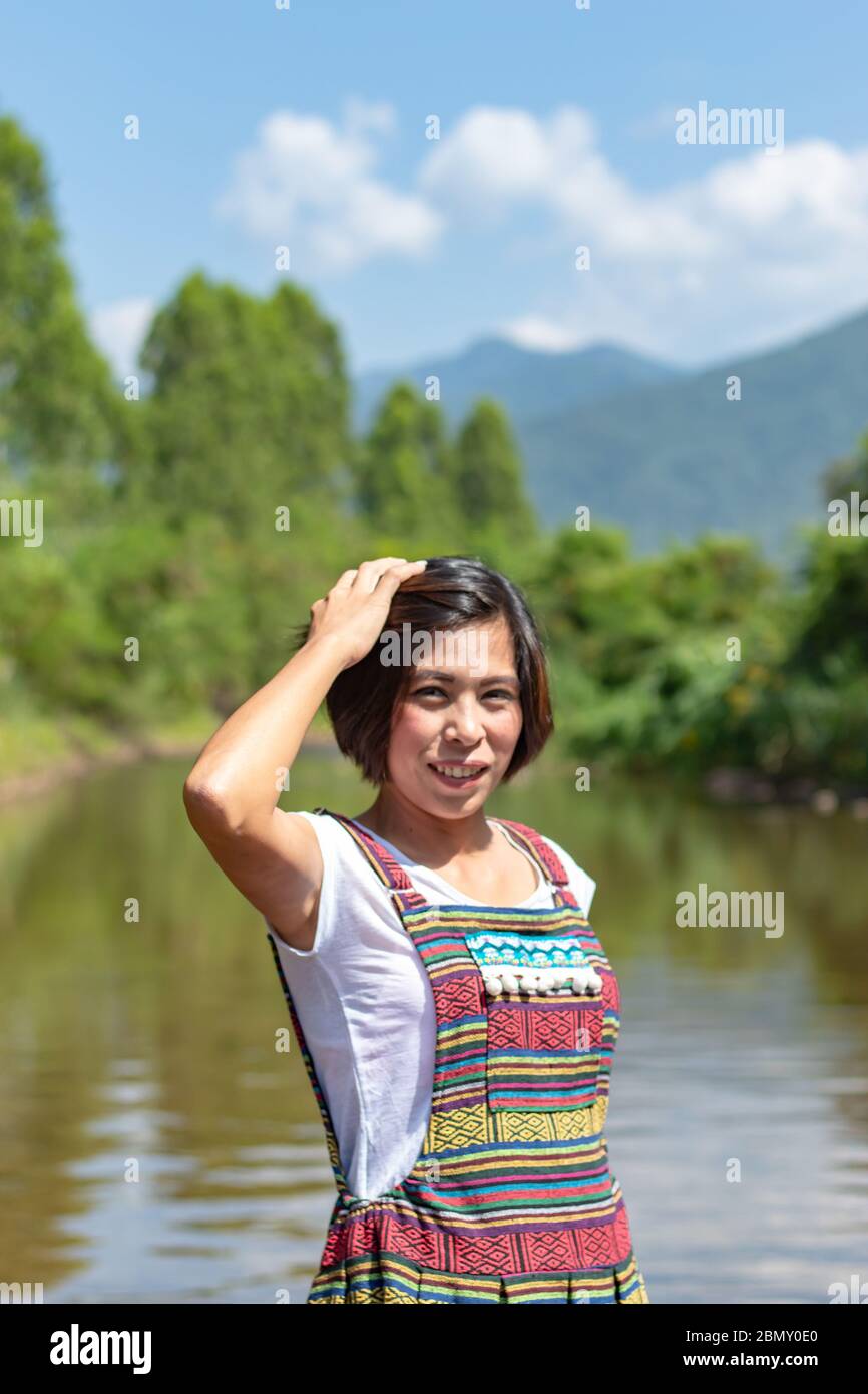 Asian women wear native Thailand Standing in a stream Stock Photo - Alamy