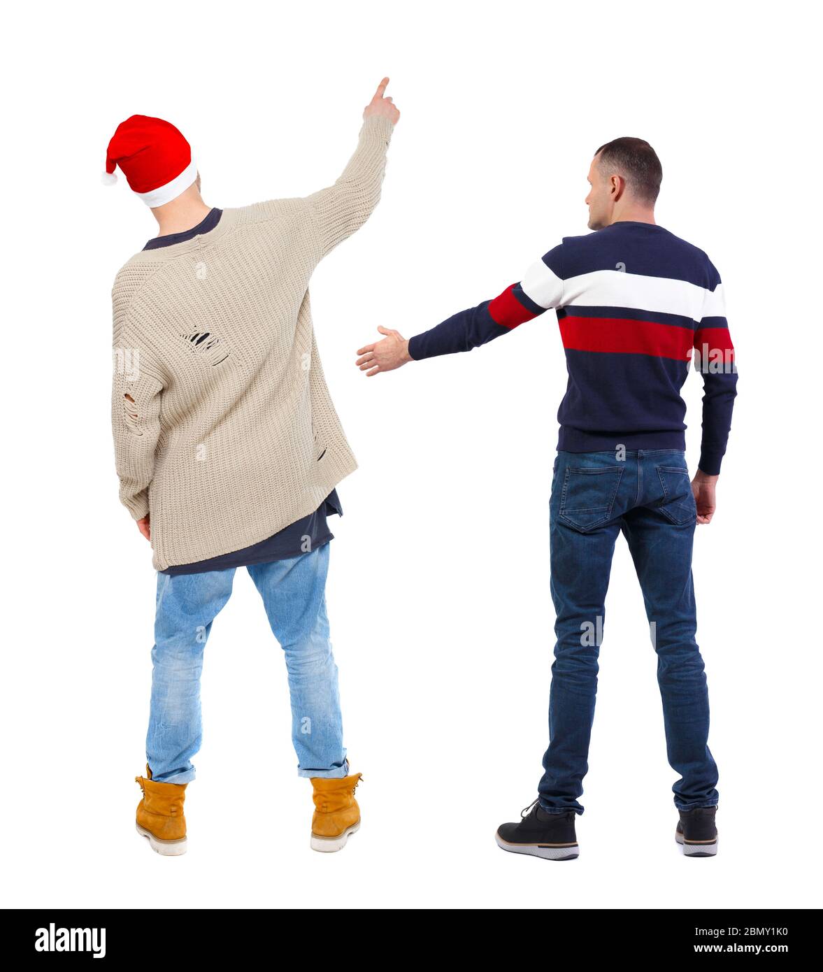 Back view of two man in sweater pointing. Rear view people collection ...