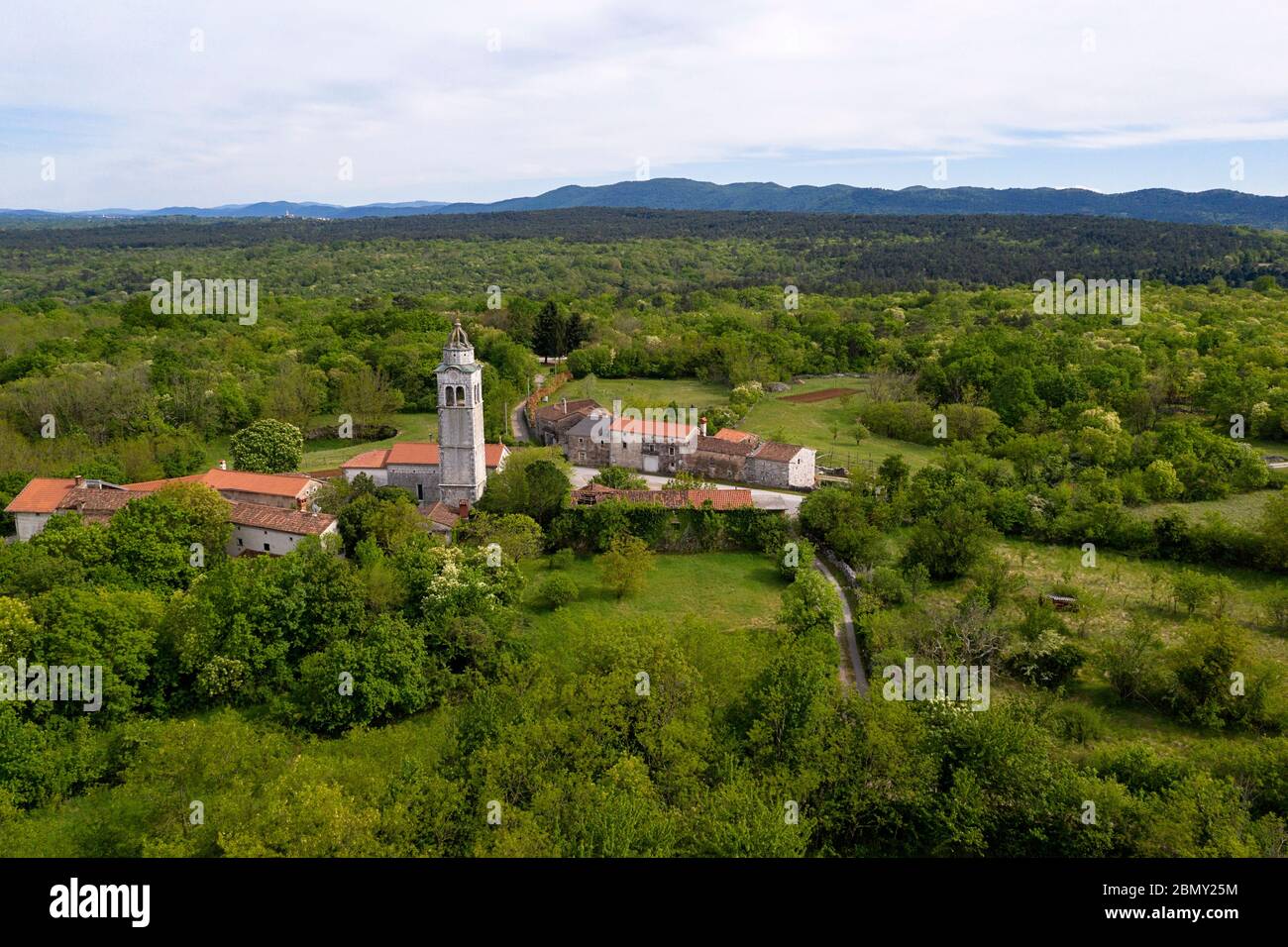 cute small old village with church tower, beautiful traditional ...