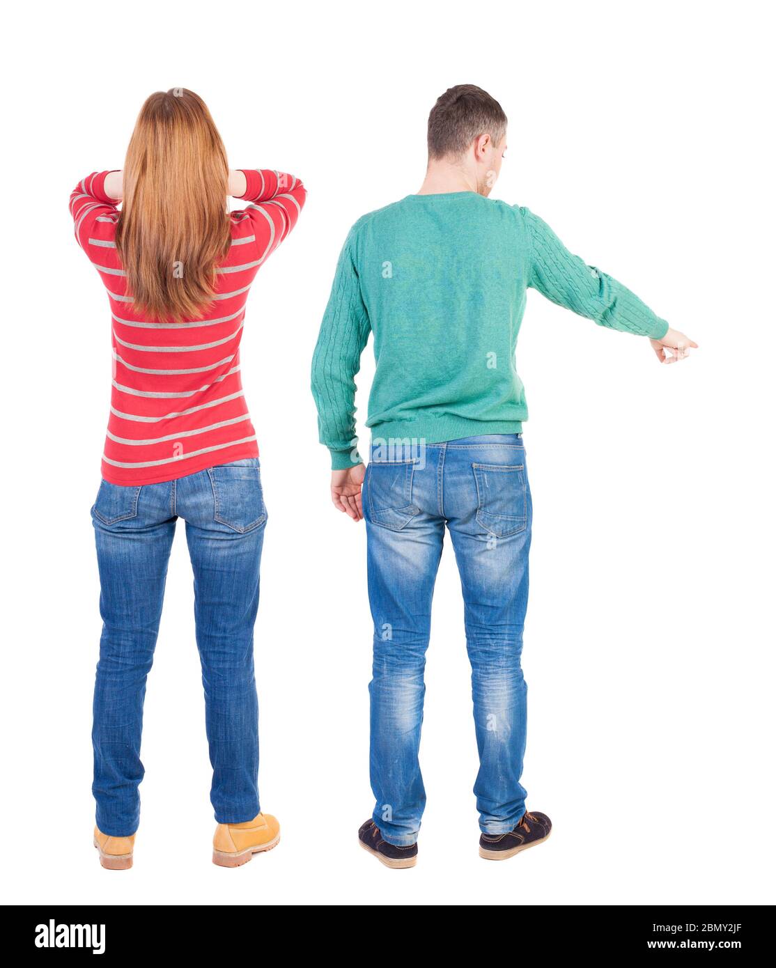 Back view of couple in sweater pointing. Rear view people collection ...