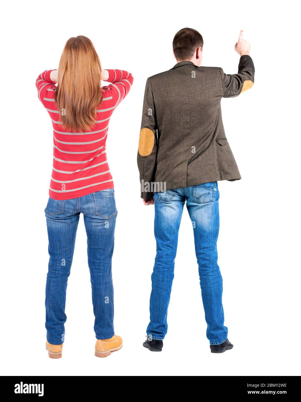 Back view of couple in sweater pointing. Rear view people collection ...