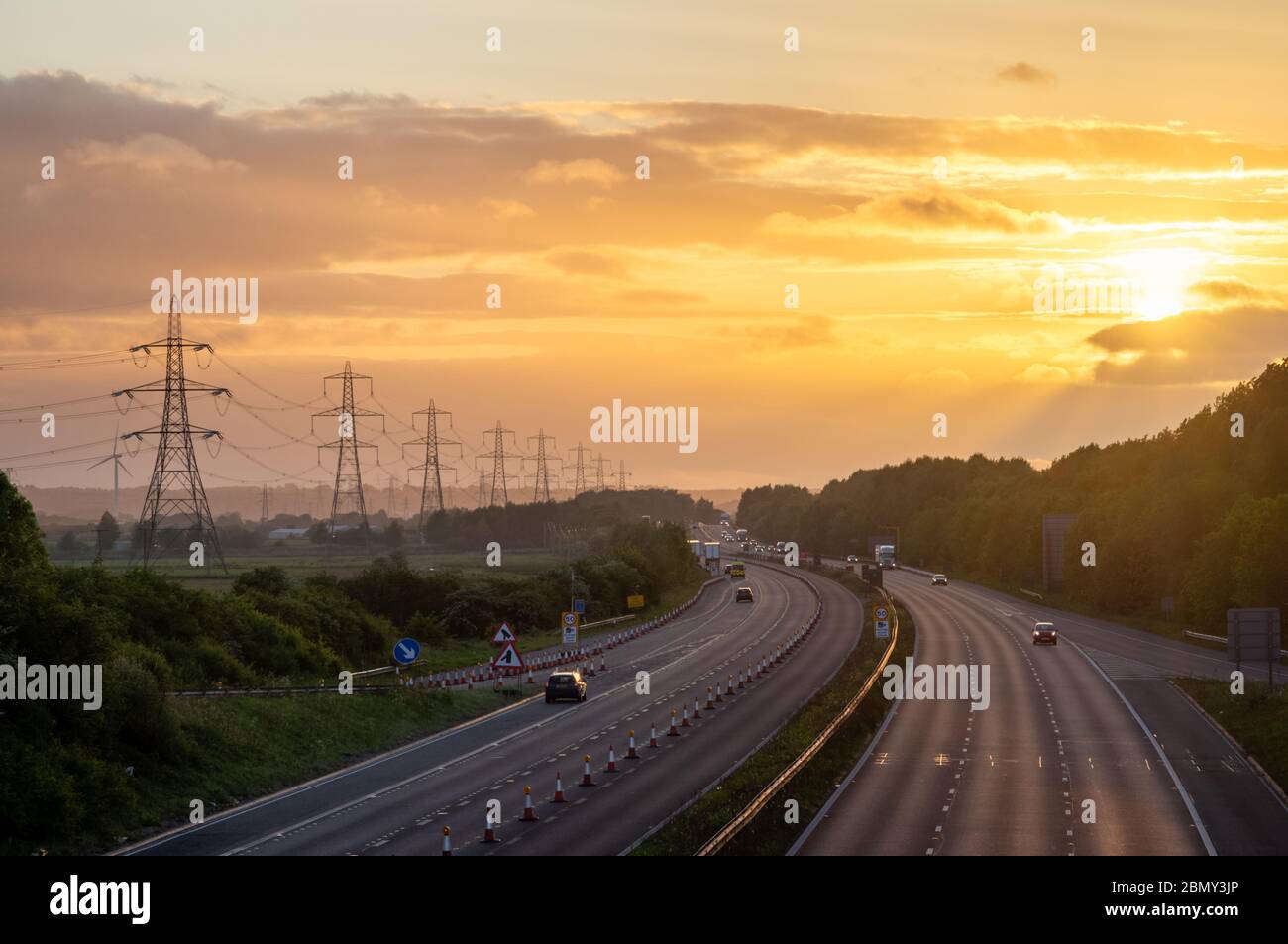 Electricity pylons at sunrise hi-res stock photography and images - Alamy