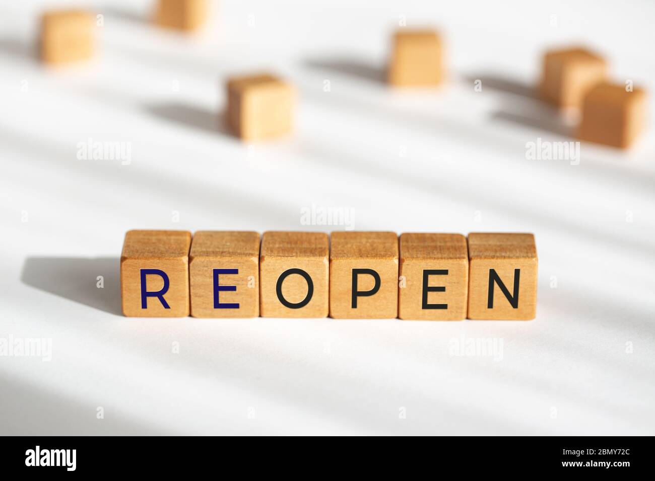 Reopen concept after the coronavirus pandemic. Wooden blocks with text ...