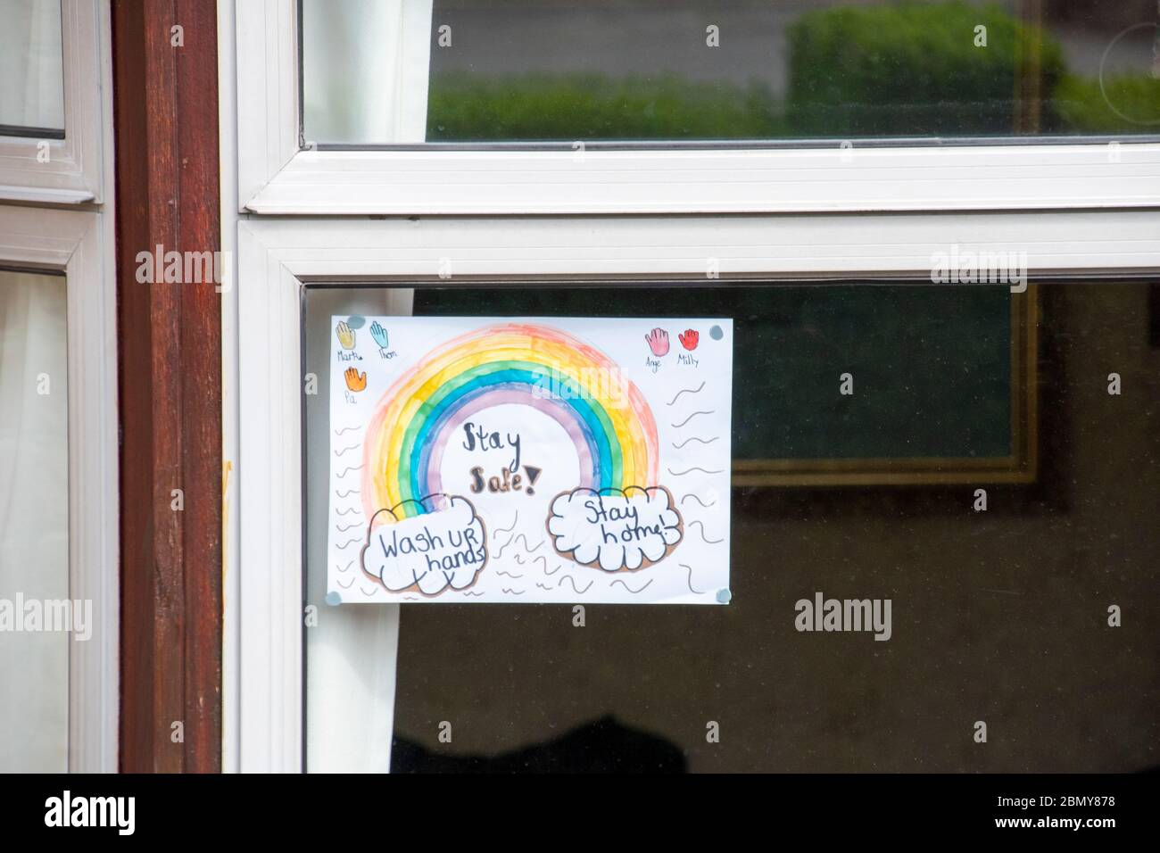 Sheffield UK – April 09 2020: Rainbow drawing in window stay safe, wash ...
