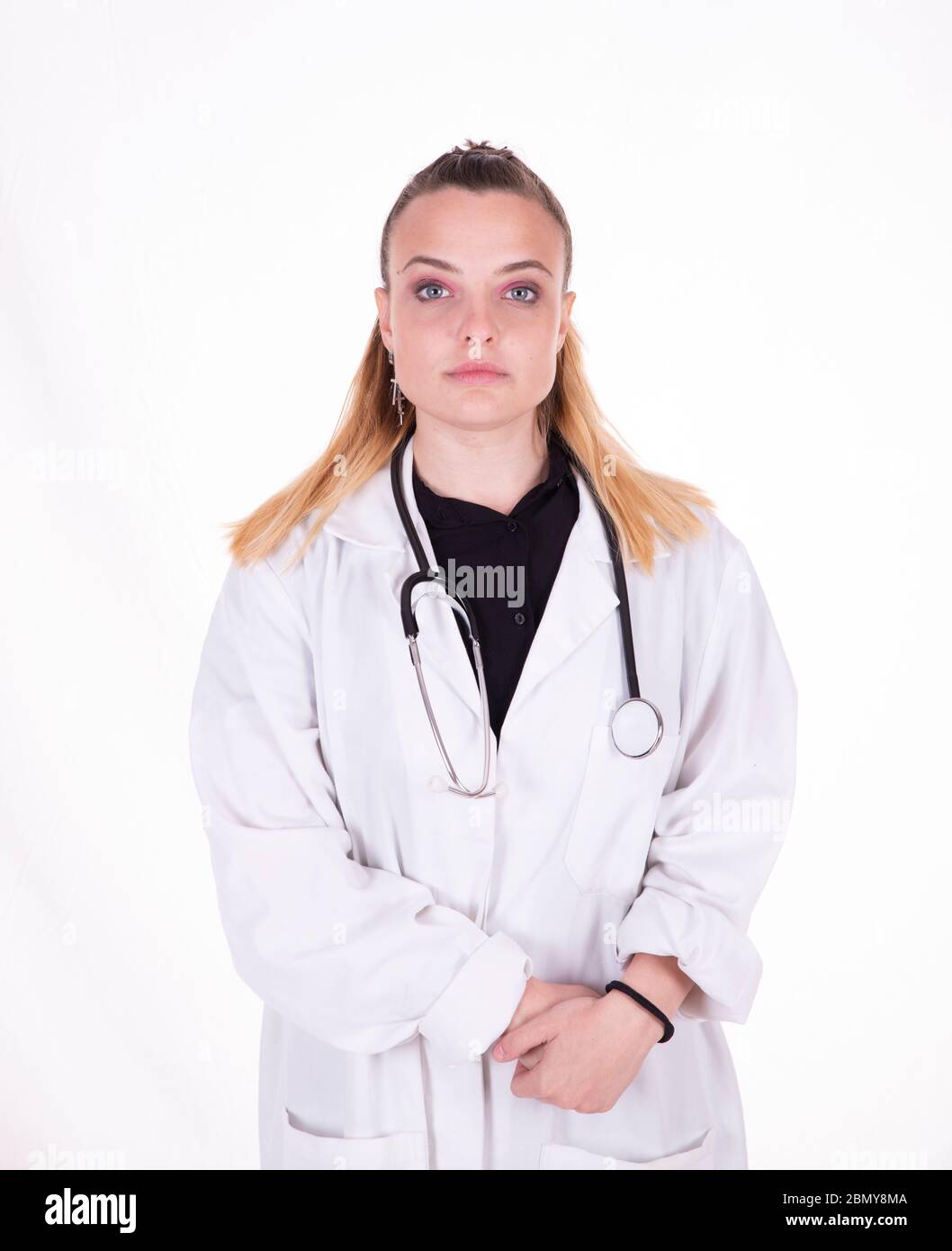 young medic with blue eye in the white background look the camera Stock ...