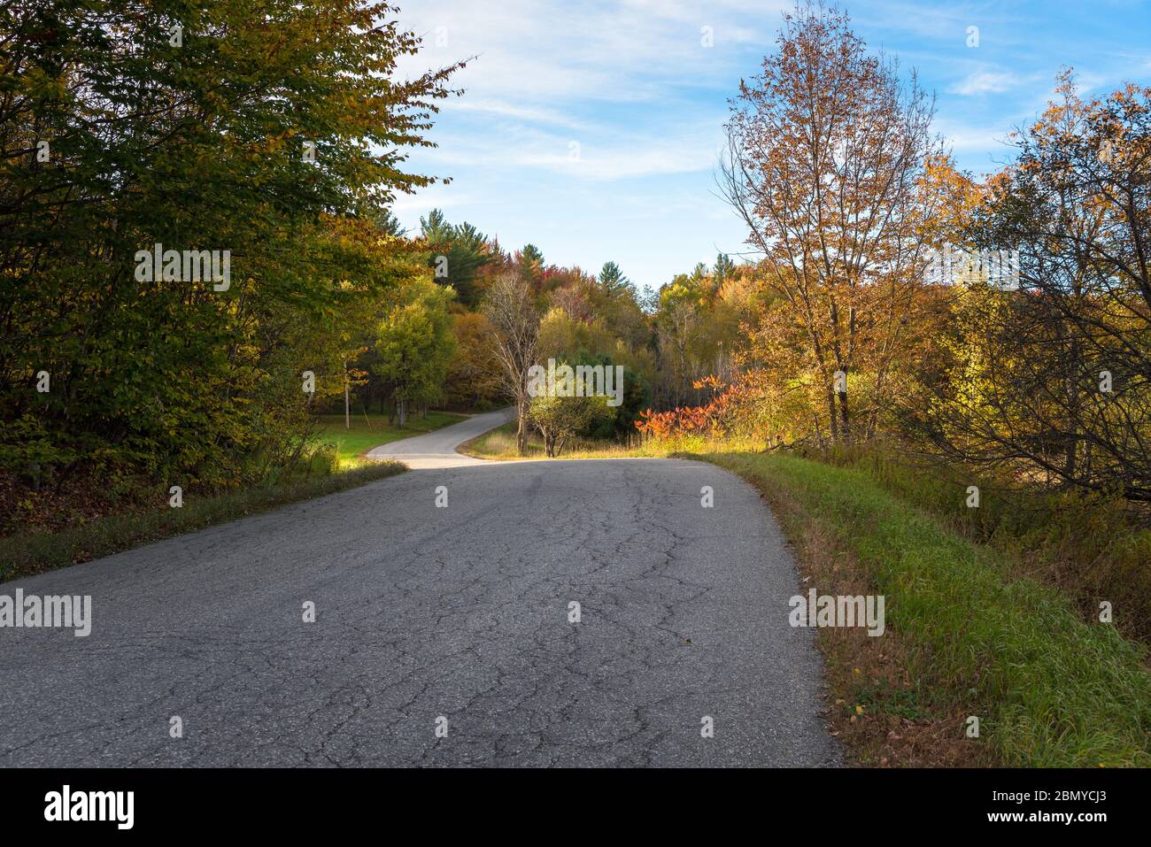 Empty road running through rural hi-res stock photography and images ...
