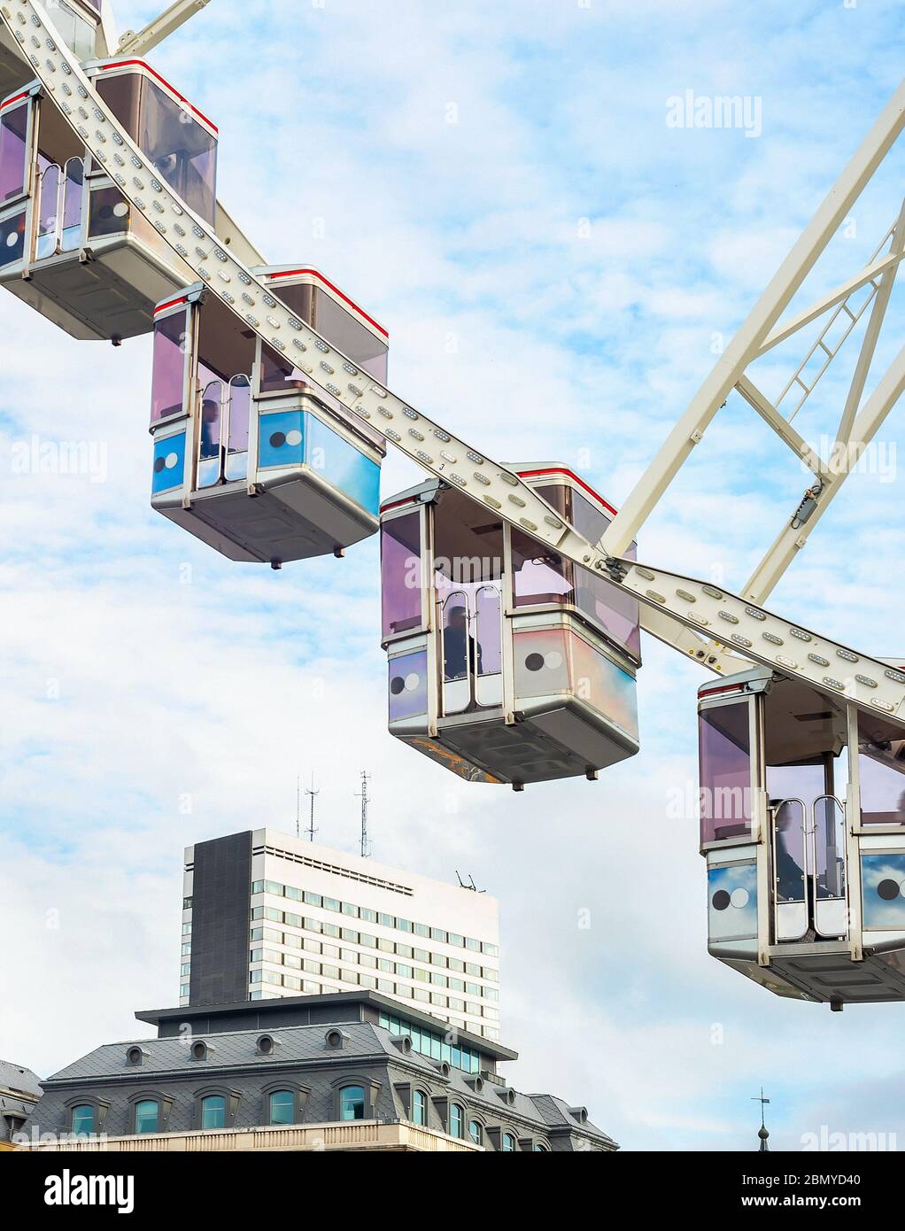 Ferris wheel cabins and downtown architecture of Brussels skywards ...