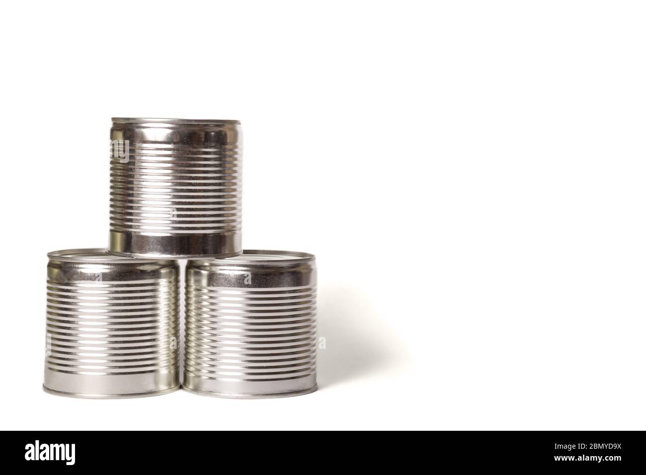 Three metal cans without labels isolated on a white Stock Photo - Alamy
