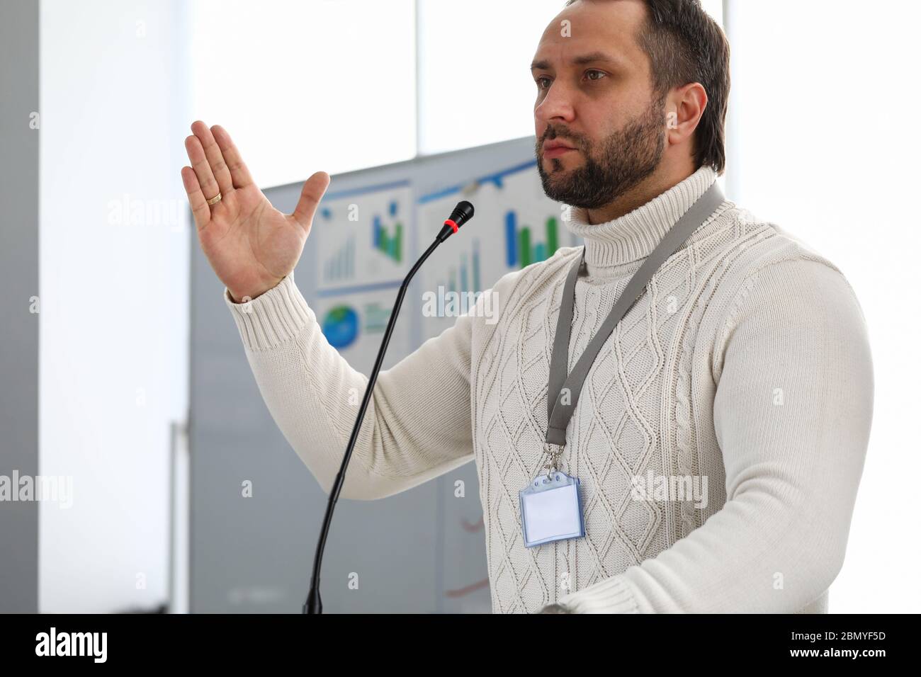 Man speaking about financial report Stock Photo - Alamy