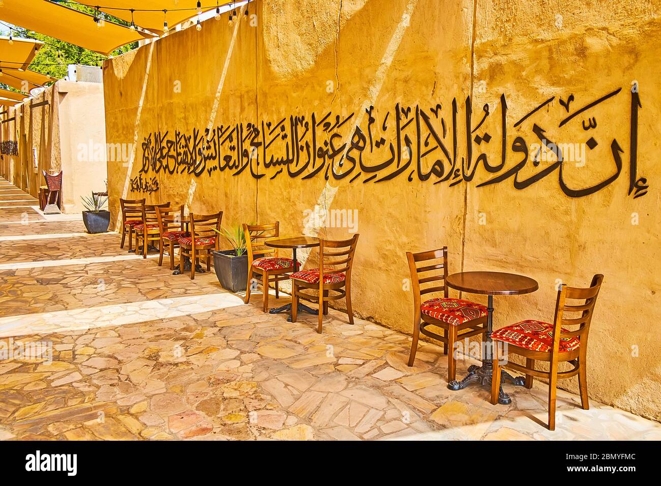DUBAI, UAE - MARCH 2, 2020: The tables of small coffee house stand at ...