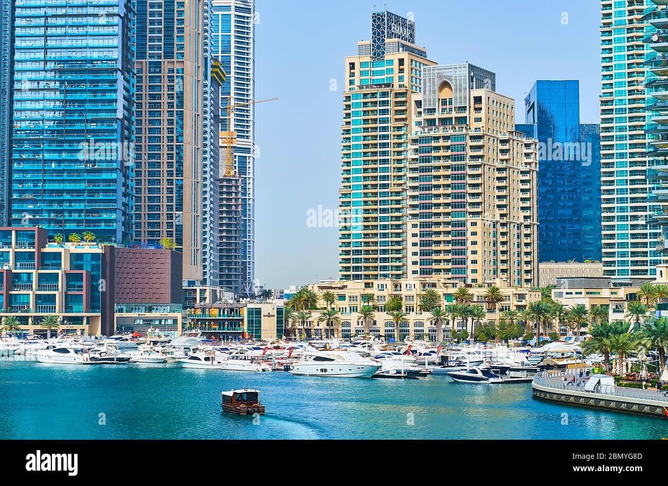 DUBAI, UAE - MARCH 2, 2020: The shipyards with moored yachts and motor ...