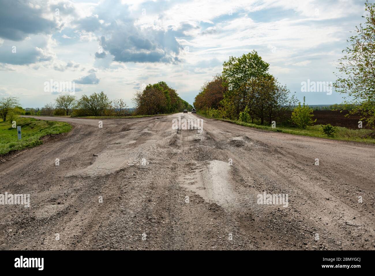 Extremely bad asphalt road. Poor quality dangerous road in Ukraine ...