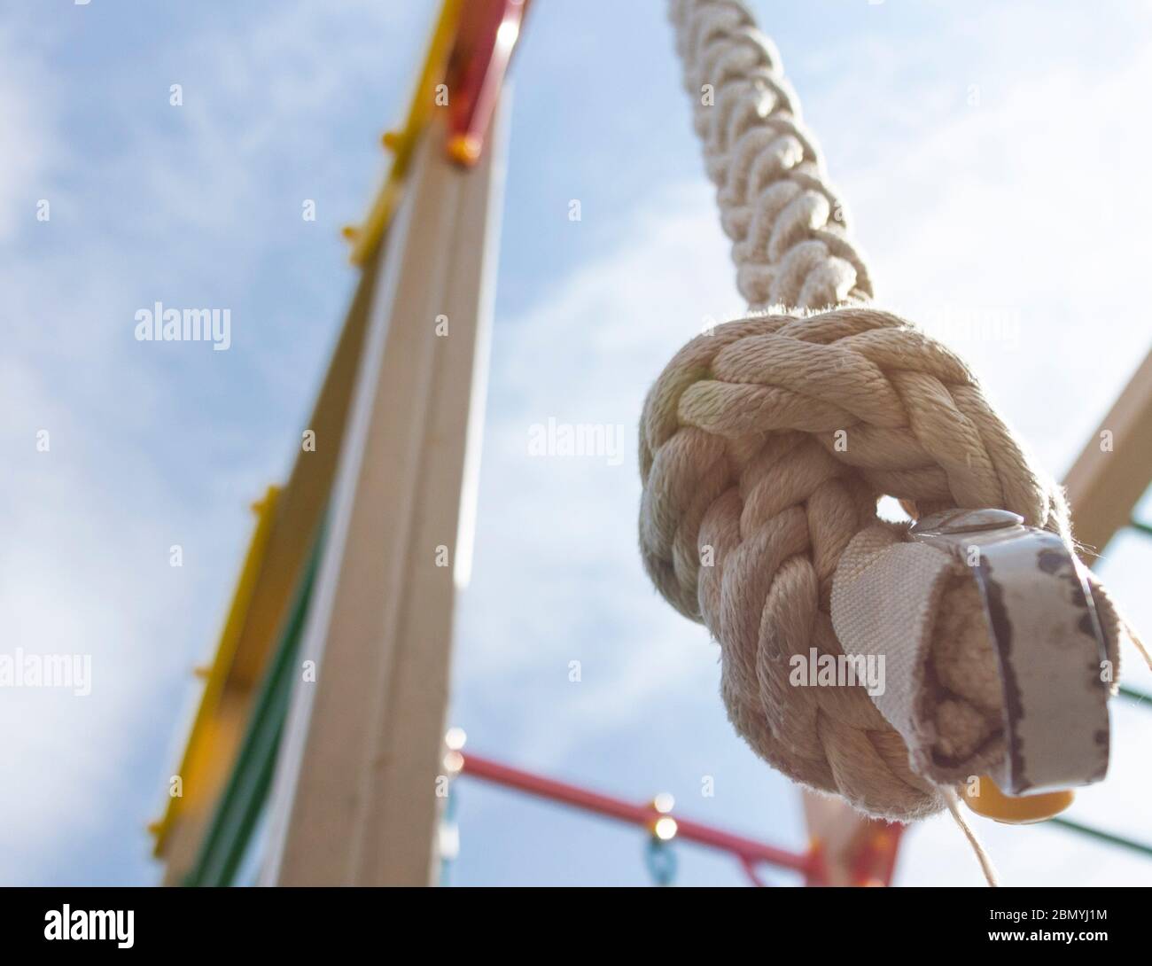 gymnastic rope in front of blue sky. Functional training Stock Photo ...