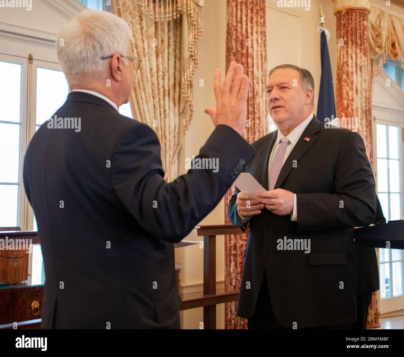 Secretary of State Michael Pompeo officiates the swearing-in of Robert ...