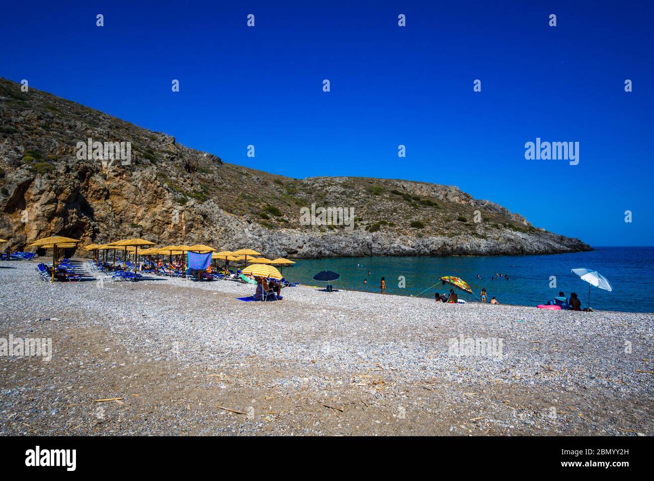 The beautiful pebbled beach of Chalkos in Kythera. Amazing scenery with ...
