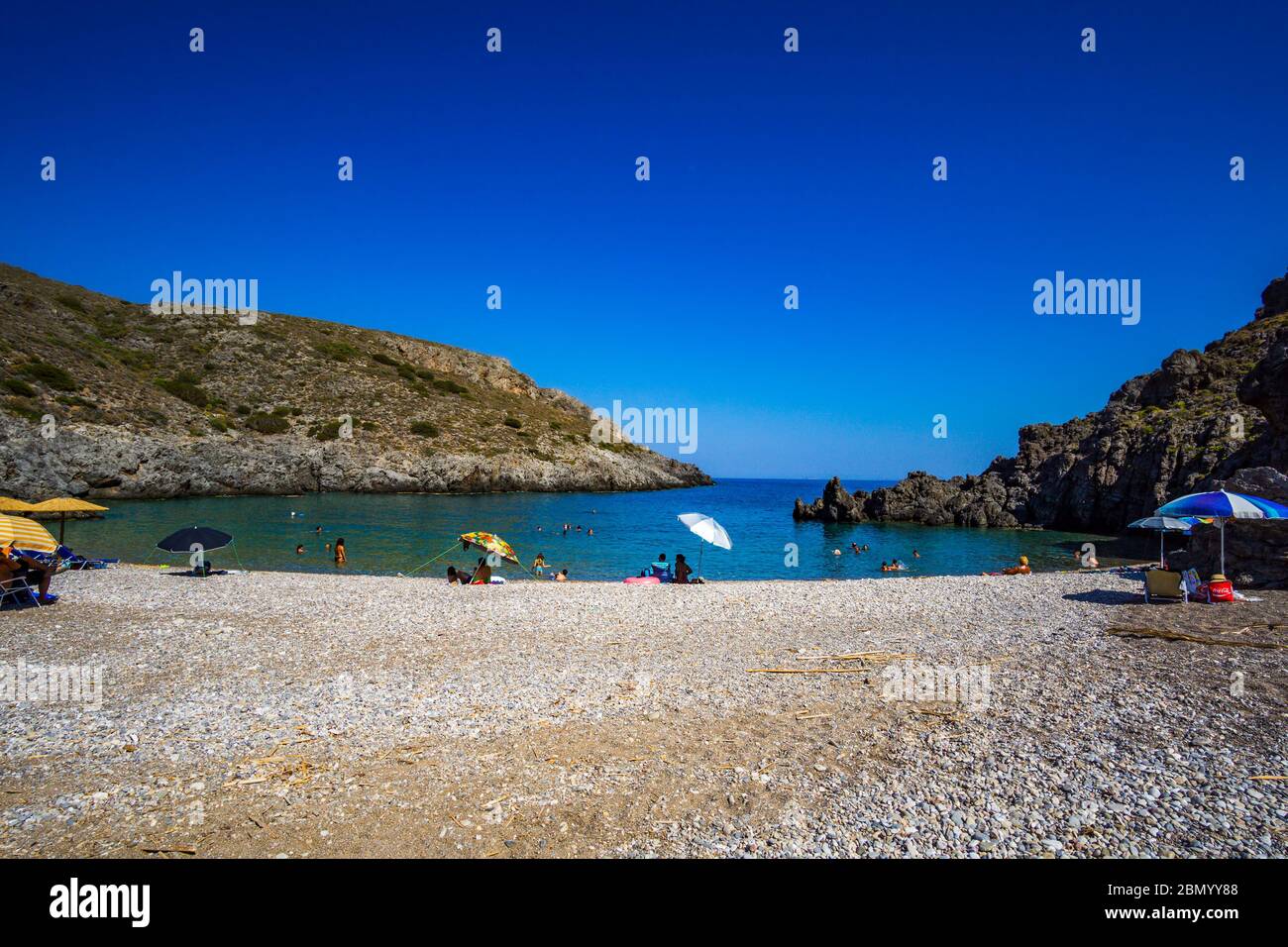 The beautiful pebbled beach of Chalkos in Kythera. Amazing scenery with ...