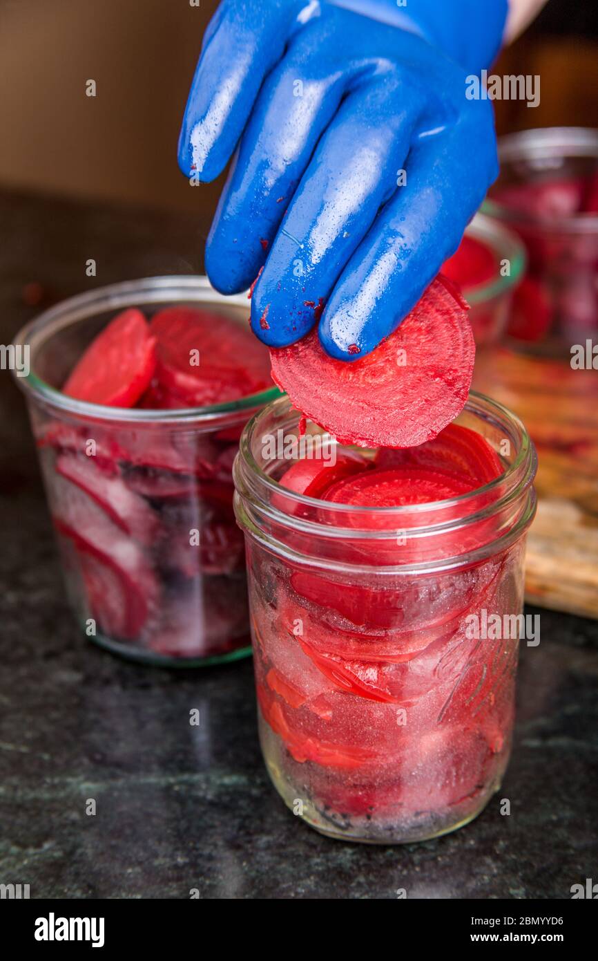 Pack the sliced beets into the canning jars. This is called "hot ...