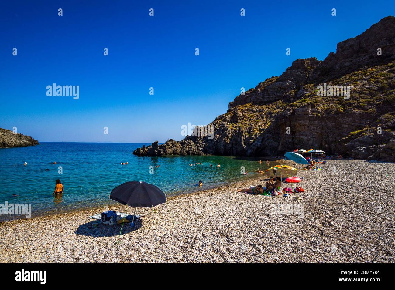 The beautiful pebbled beach of Chalkos in Kythera. Amazing scenery with ...