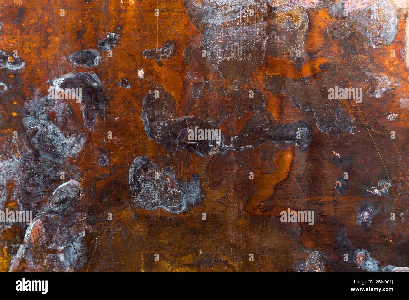texture of old oxidated sheet of brass with colorful spots and some ...