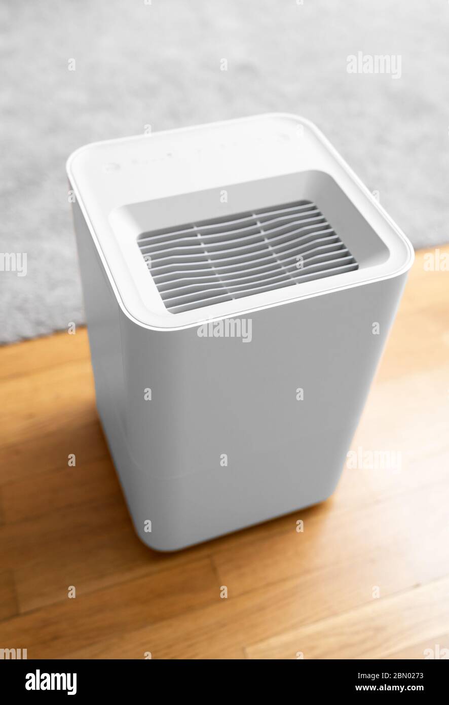 Air purifier in the room. Air washing system Stock Photo - Alamy