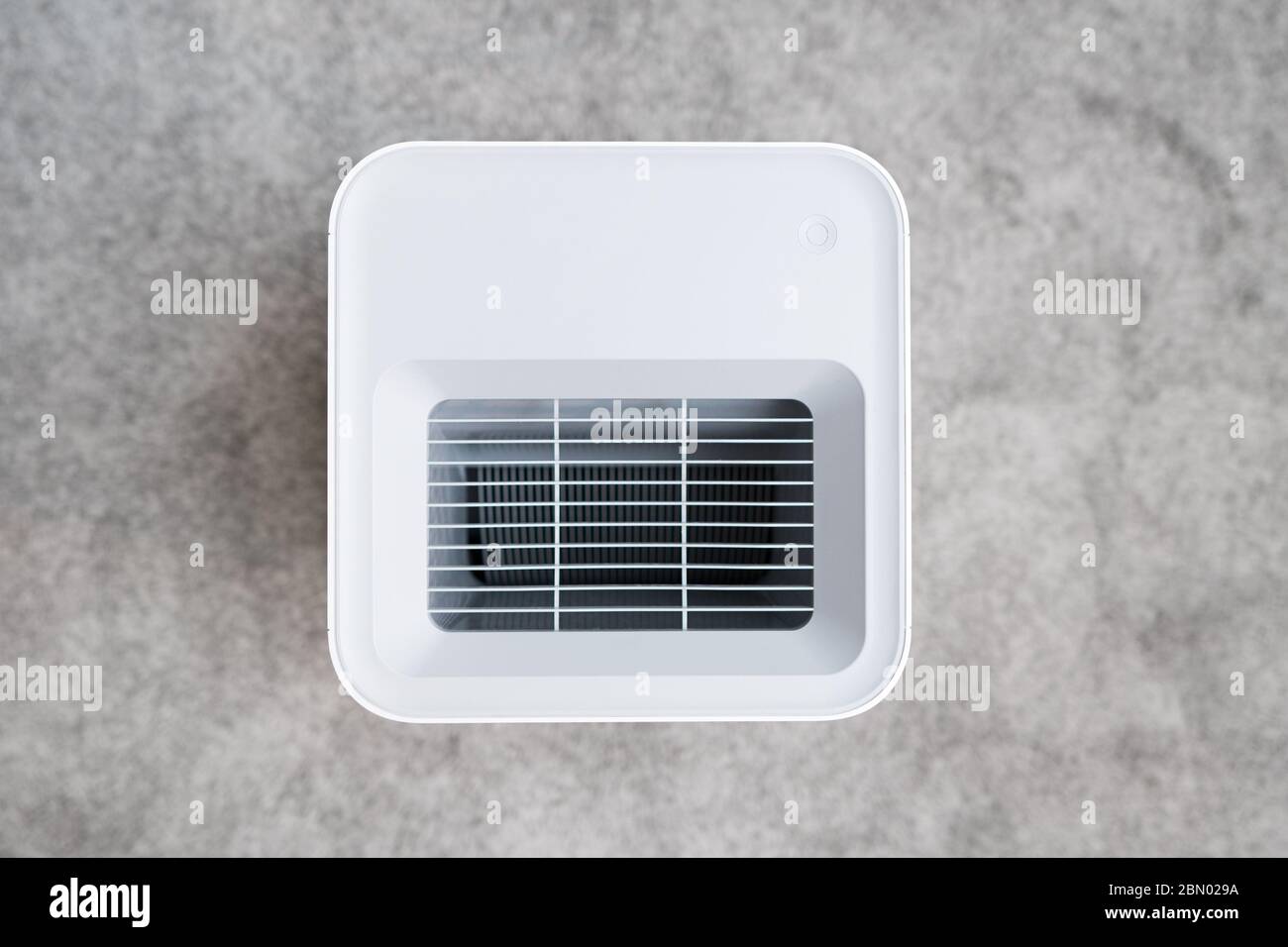 Air purifier in the room. Air washing system Stock Photo - Alamy