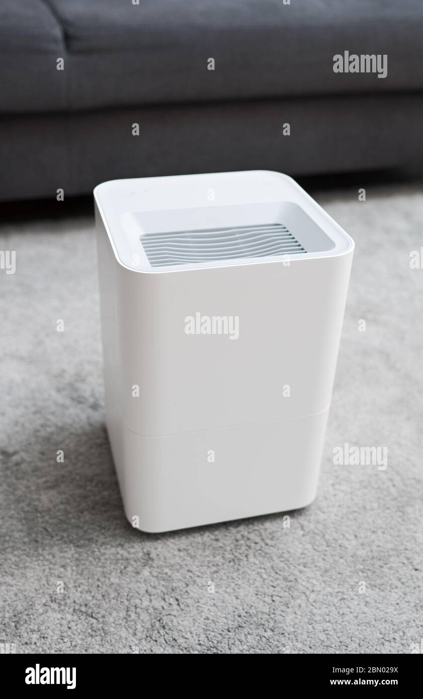 Air purifier in the room. Air washing system Stock Photo - Alamy