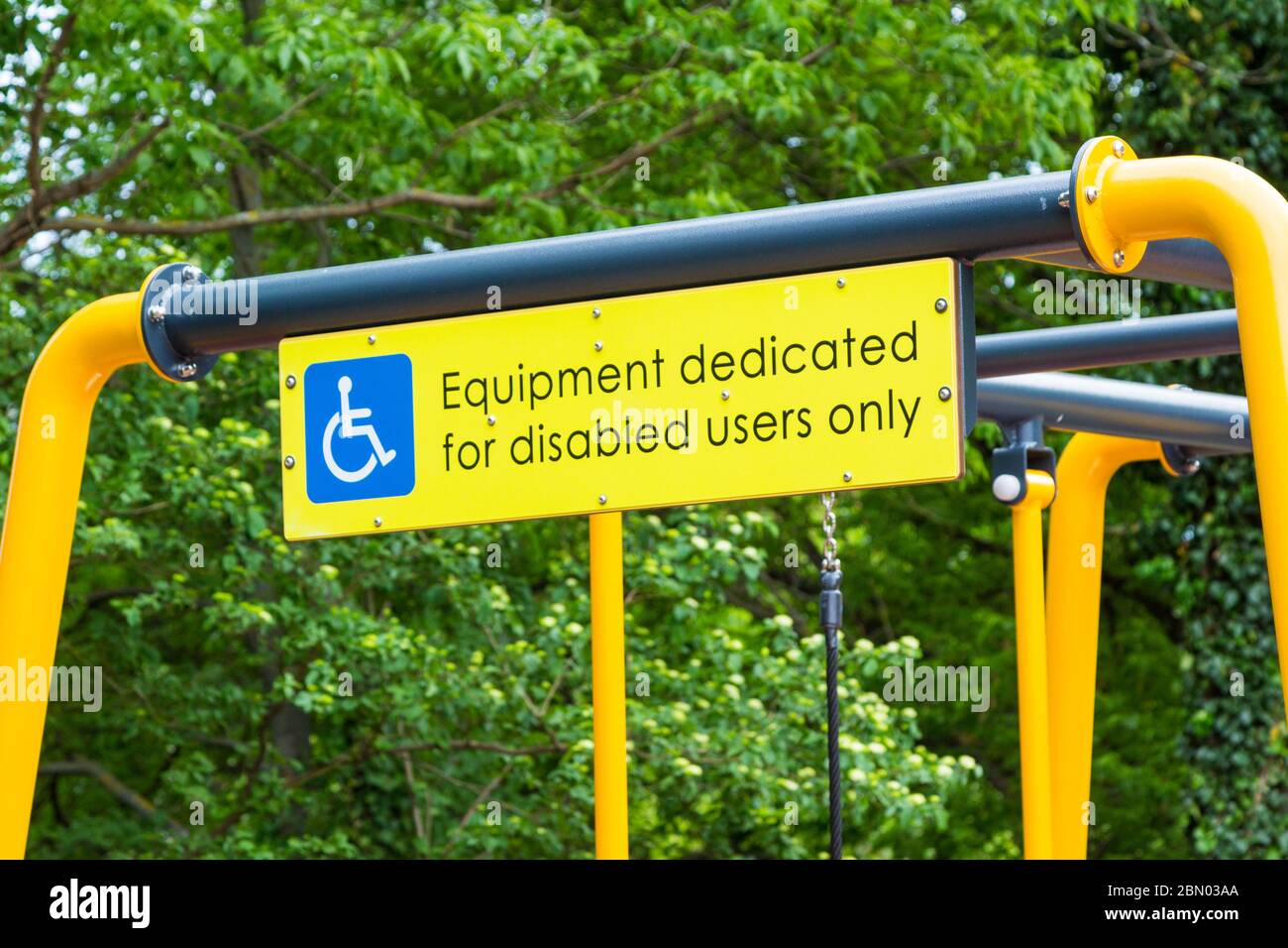 Sign "Equipment dedicated for disabled users only" at playground ...