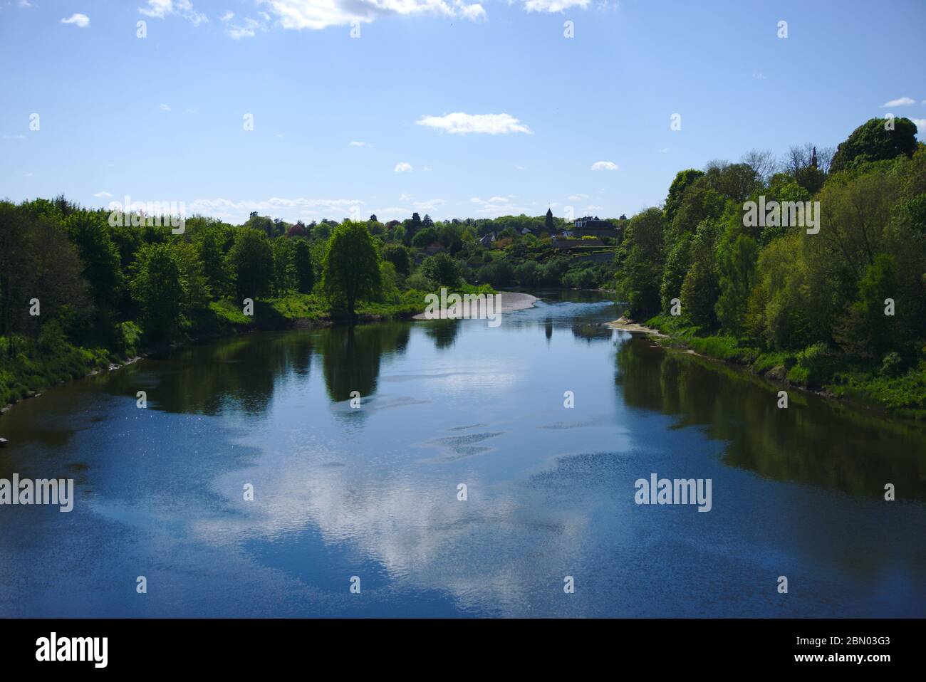 View west from Coldstream Bridge of the River Tweed, which marks the ...