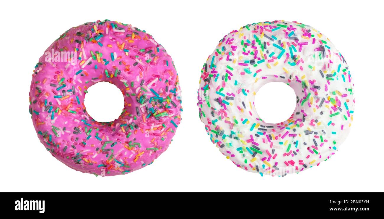 Two pink and white donuts decorated with colorful sprinkles isolated on ...