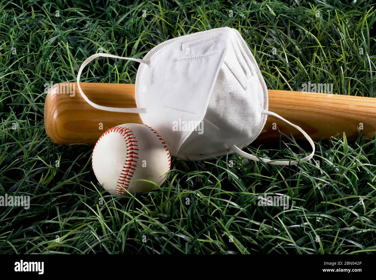 Baseball season with N95 face mask ,ball and bat Stock Photo - Alamy