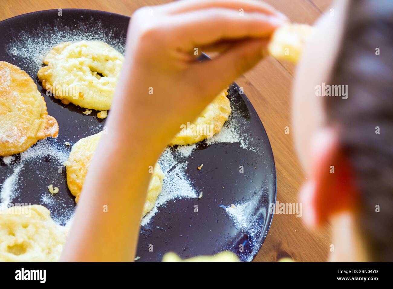 Fried battered apple fritters hi-res stock photography and images - Alamy