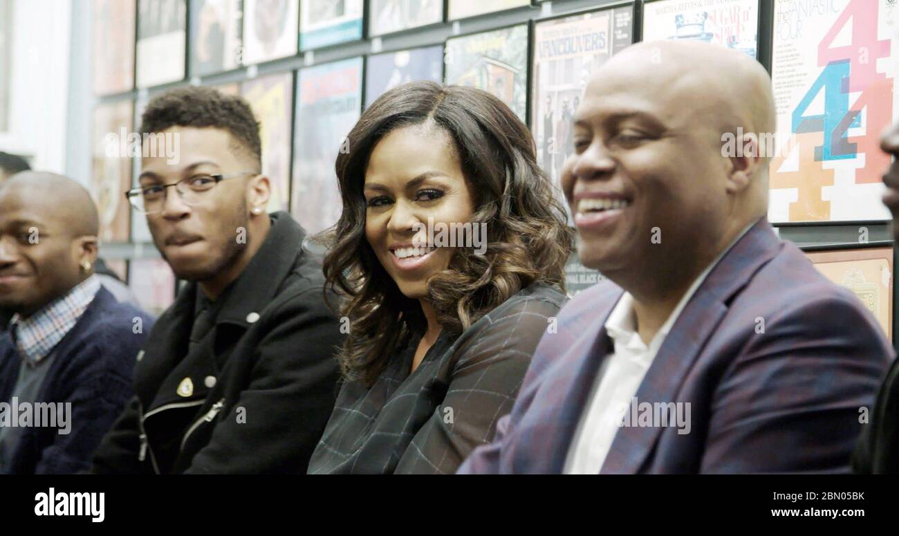 BECOMING, Michelle Obama (center) with her brother Craig Robinson ...