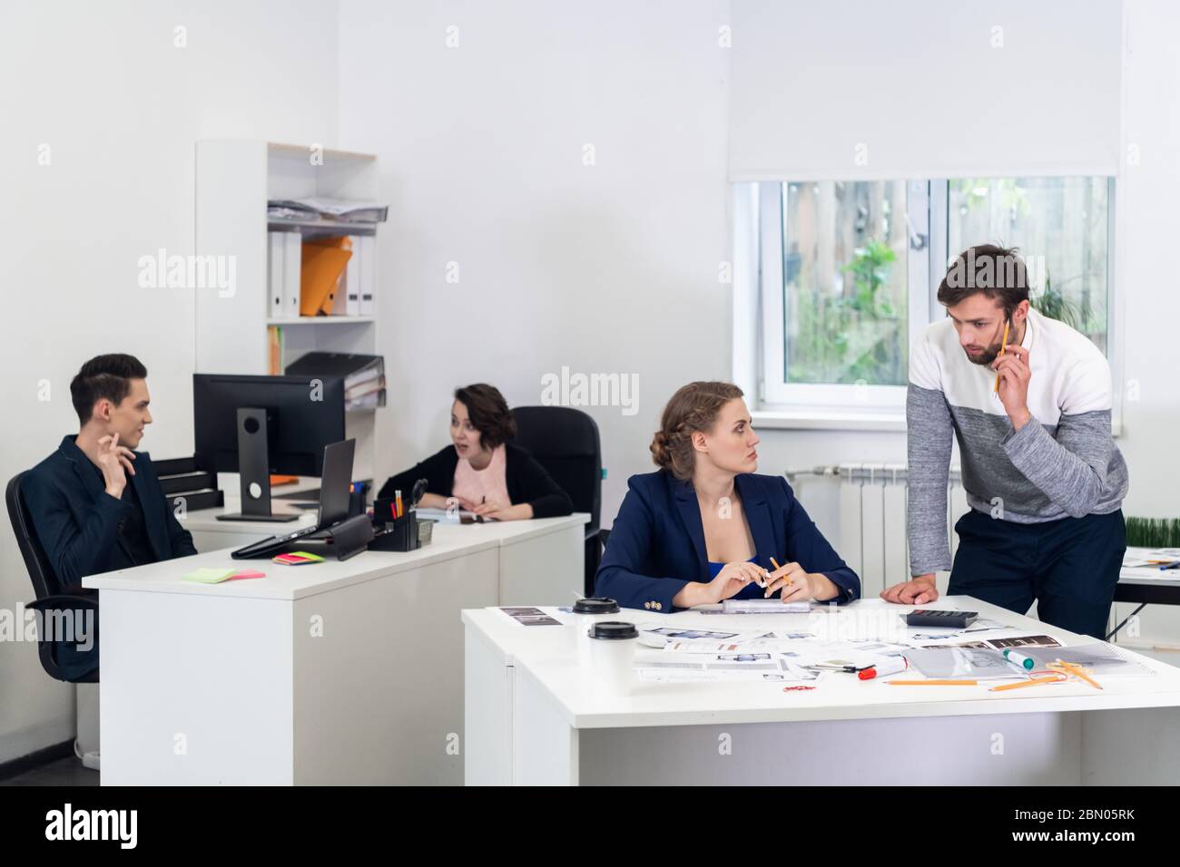 Daily work routine in a shared office Stock Photo - Alamy