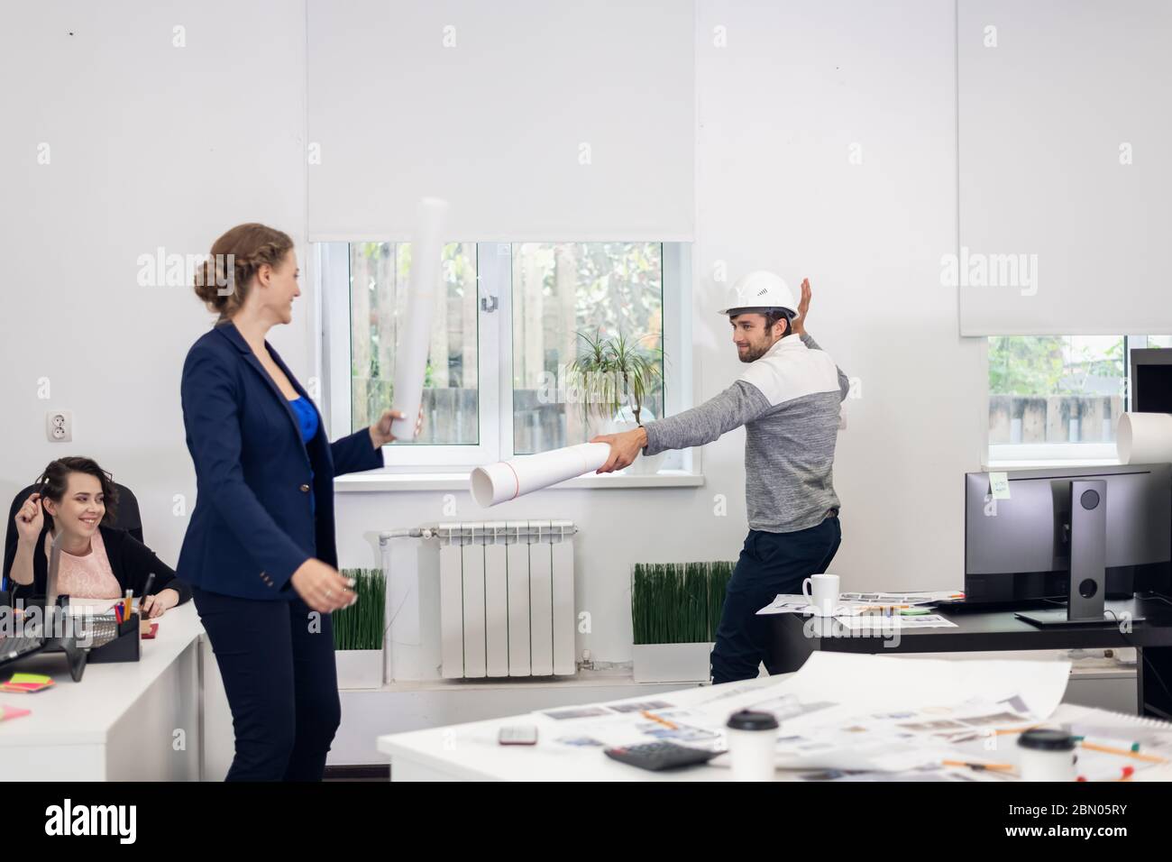 A happy business team having fun in the office after a hard work Stock ...