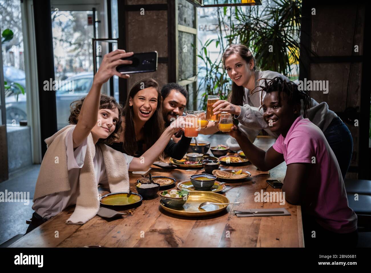 Group of students making a self-portrait with the phone camera Stock ...