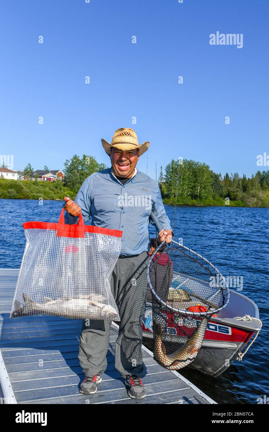 Indigenous Fishing competition, Northern Quebec Stock Photo - Alamy