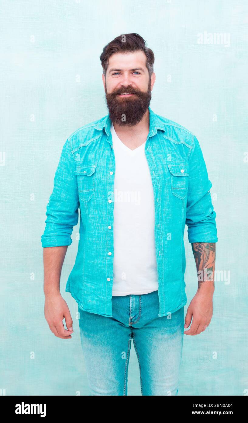 Denim look. Brutal hipster with mustache. Barbershop client. Mature ...