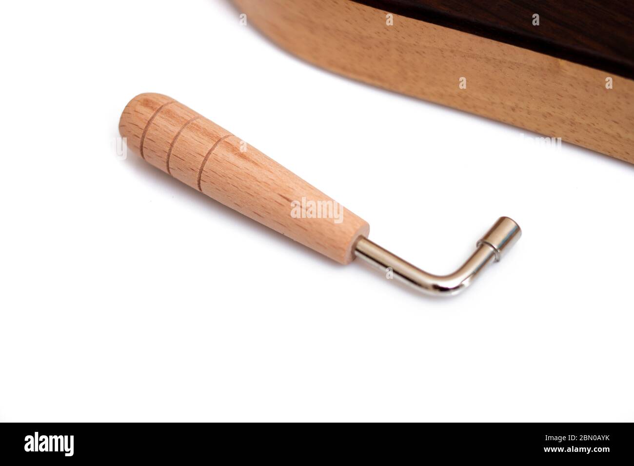 tuning tool for stringed musical instruments isolated on a white ...