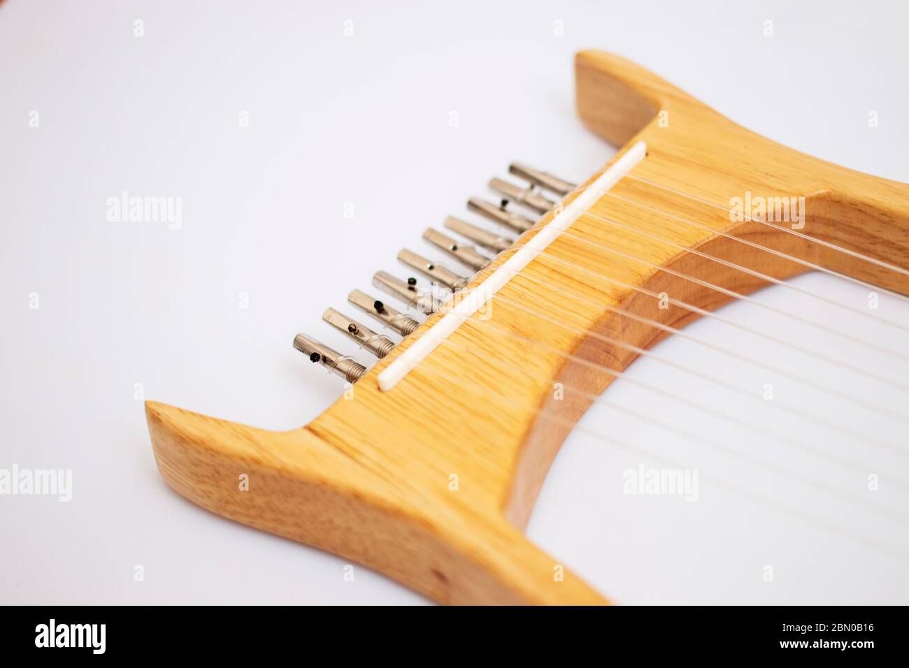 stringed lyre musical instrument isolated on a white background Stock ...