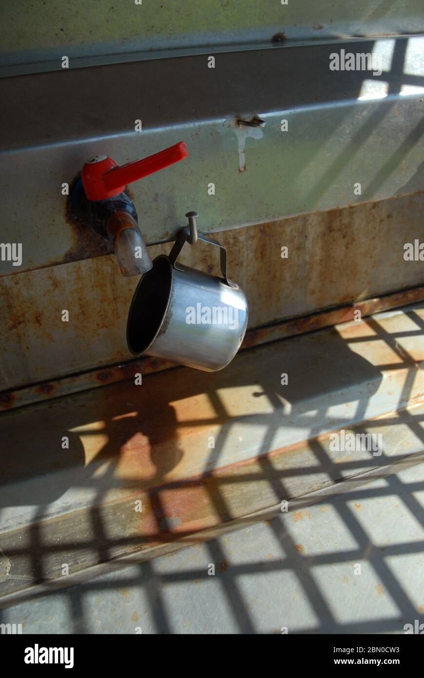 Tap and Empty Water Cups, Yangon, Myanmar Stock Photo - Alamy