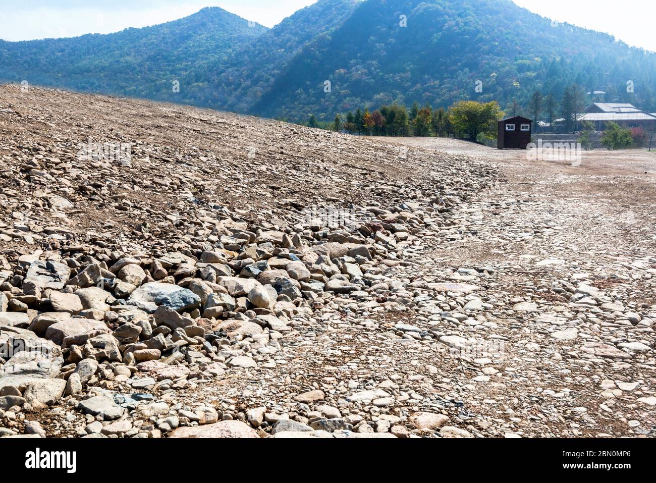 Empty debris pavement and tranquil rural natural landscape Stock Photo ...