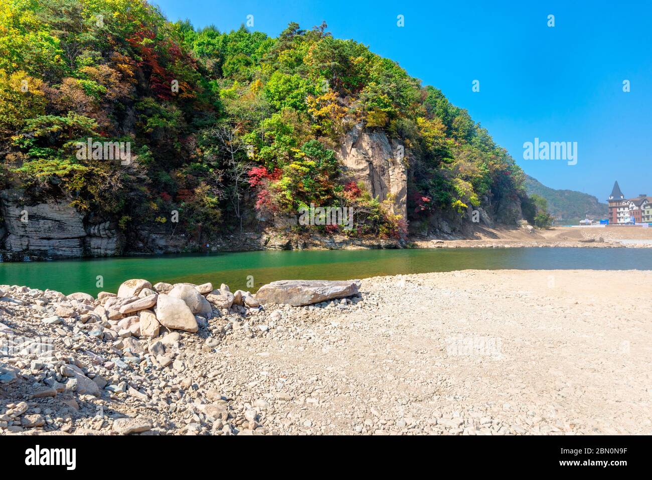 Empty rocky pavement and clean and comfortable autumn natural landscape ...