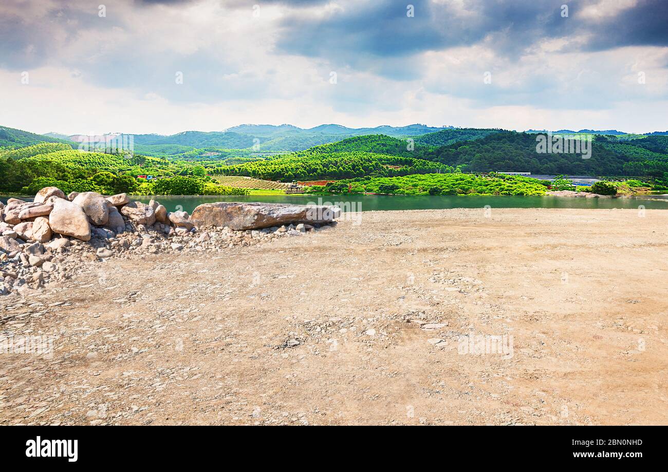 Empty debris pavement and tranquil rural natural landscape Stock Photo ...