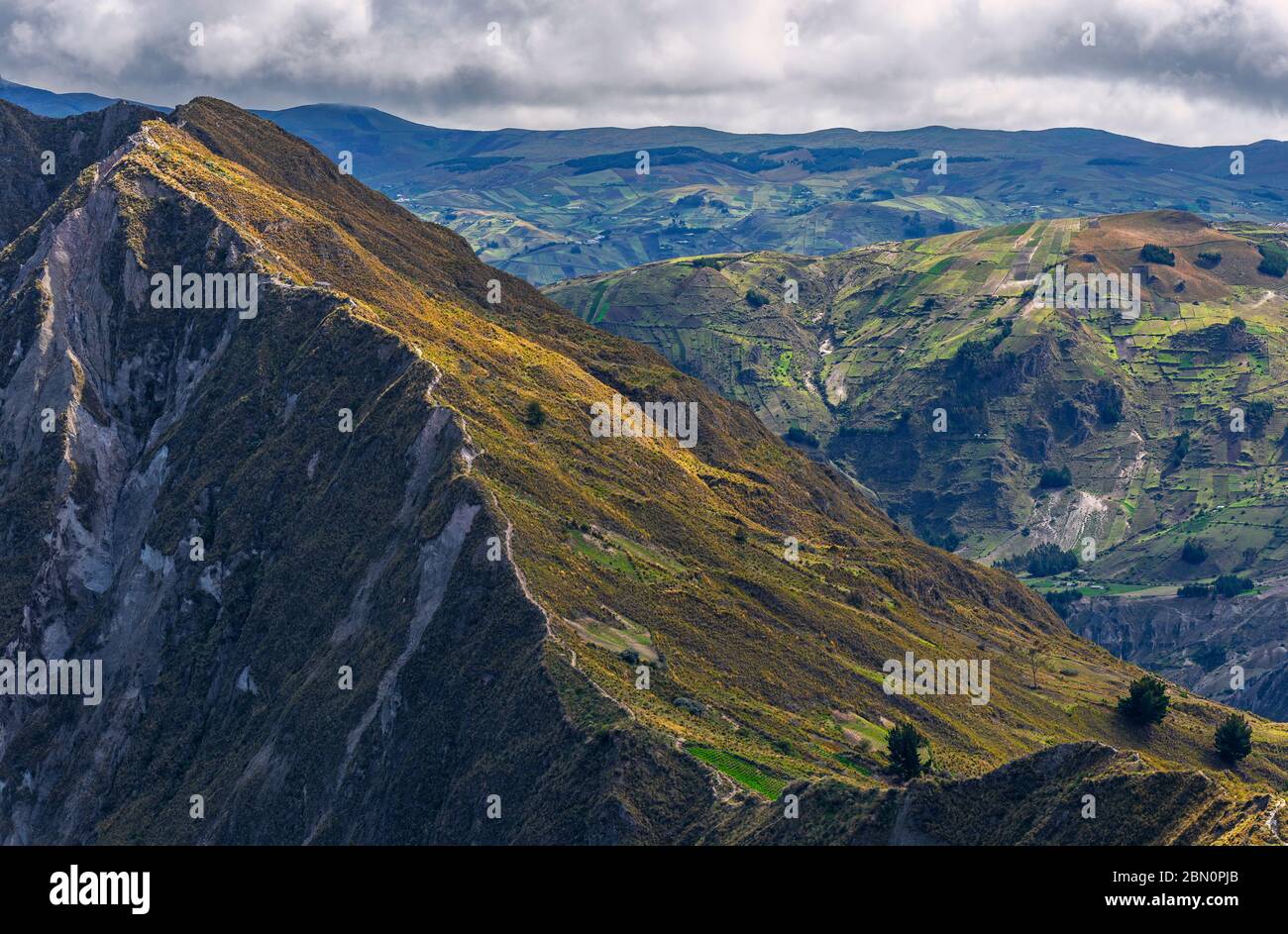 The hiking path leading to the highest peak along the Quilotoa Loop ...